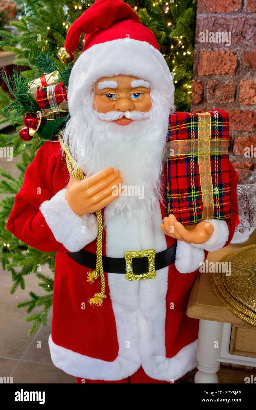Father Christmas toy standing upright UK Stock Photo - Alamy