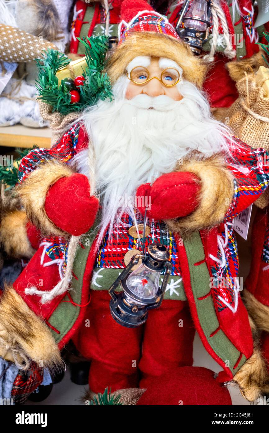 Father Christmas toy standing upright UK Stock Photo - Alamy