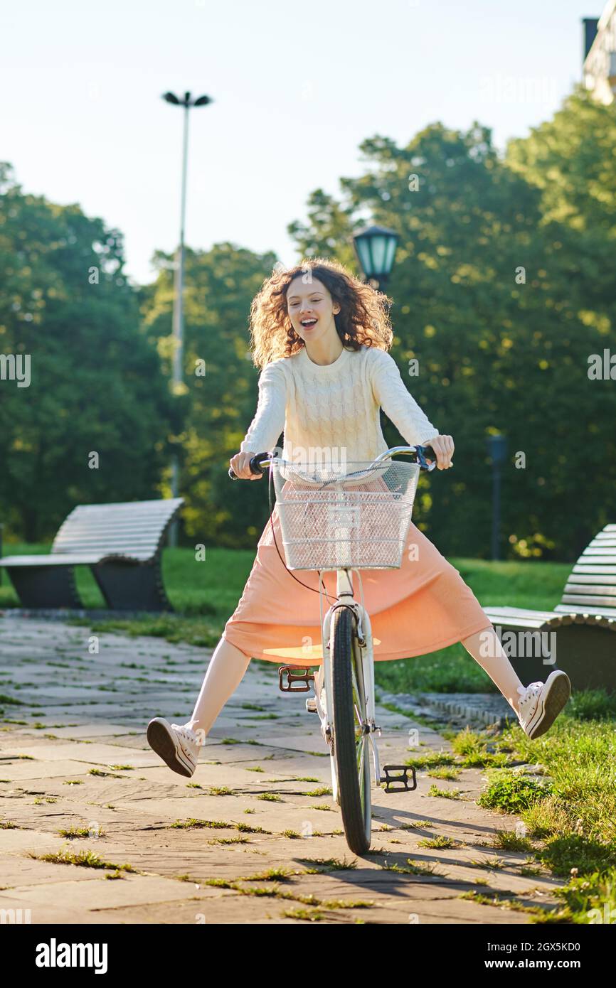 A girl riding a nike and having fun Stock Photo - Alamy