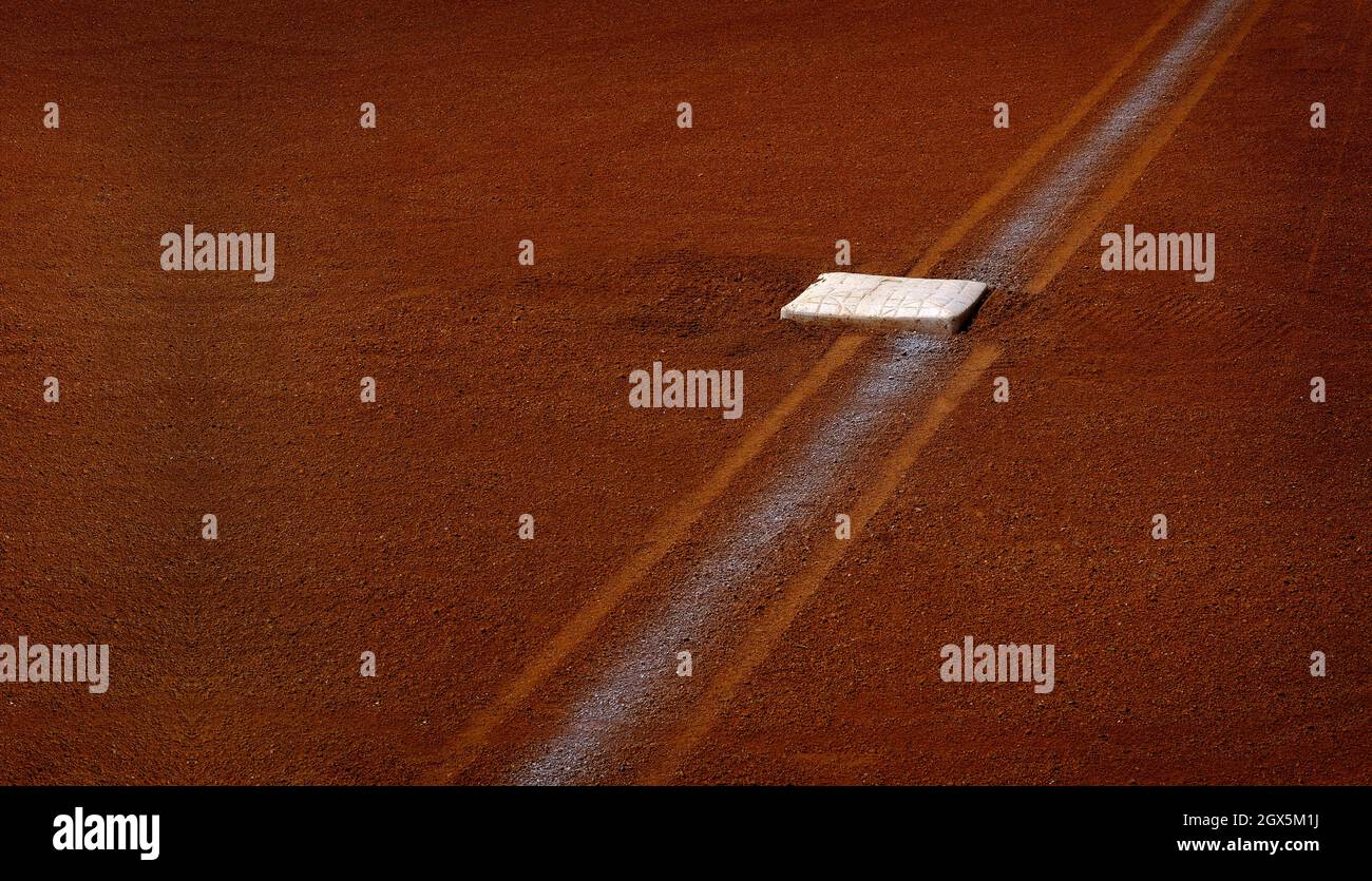 Baseball base and chalked base line in diamond Stock Photo - Alamy