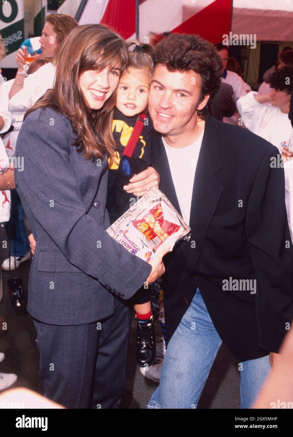 London, UK. LIBRARY. Singer Paul Young, Stacey Smith (Stacey Young) and their daughter Levi ...
