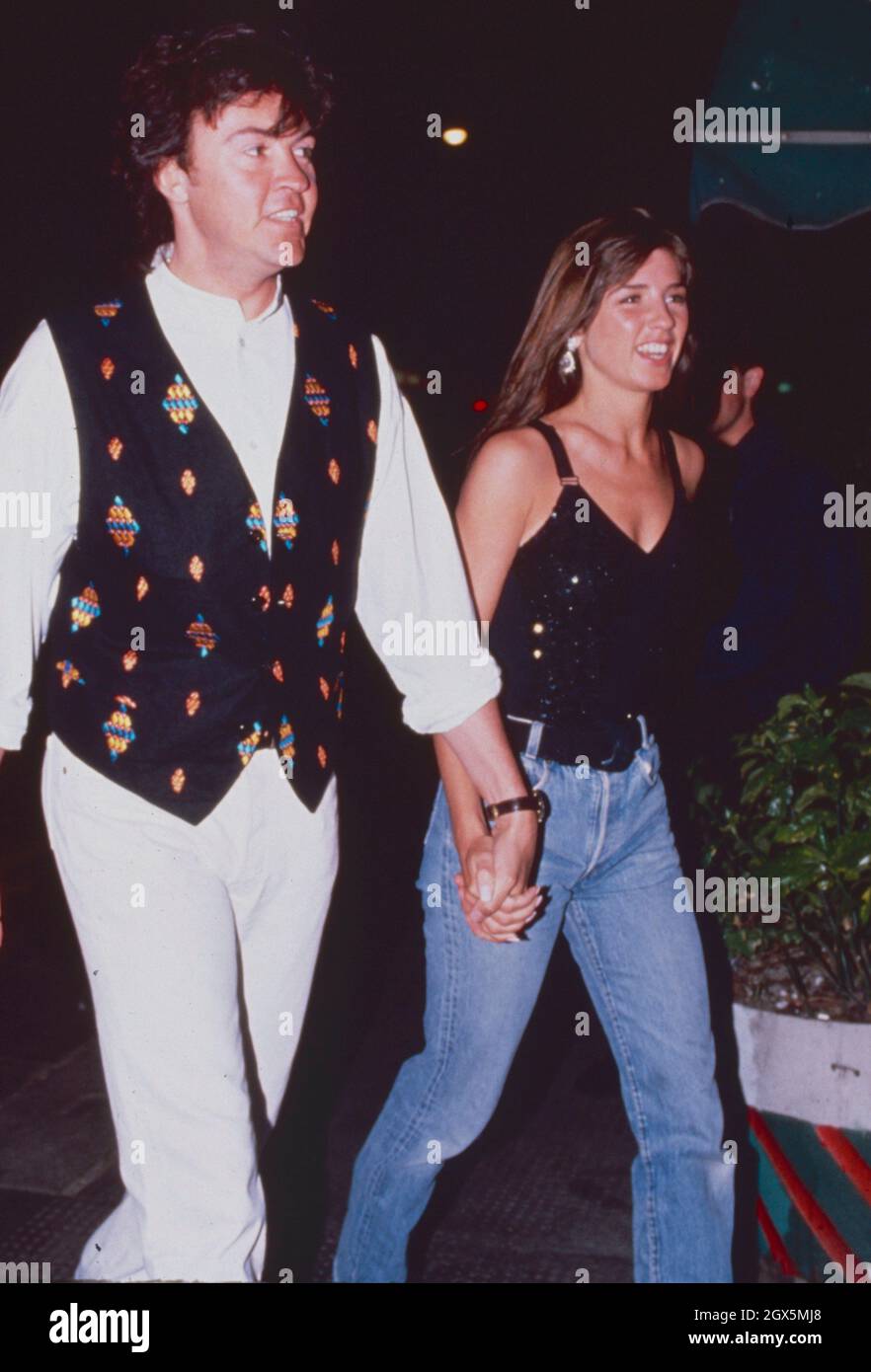 London, UK. LIBRARY. Singer Paul Young and Stacey Smith (also Stacey ...