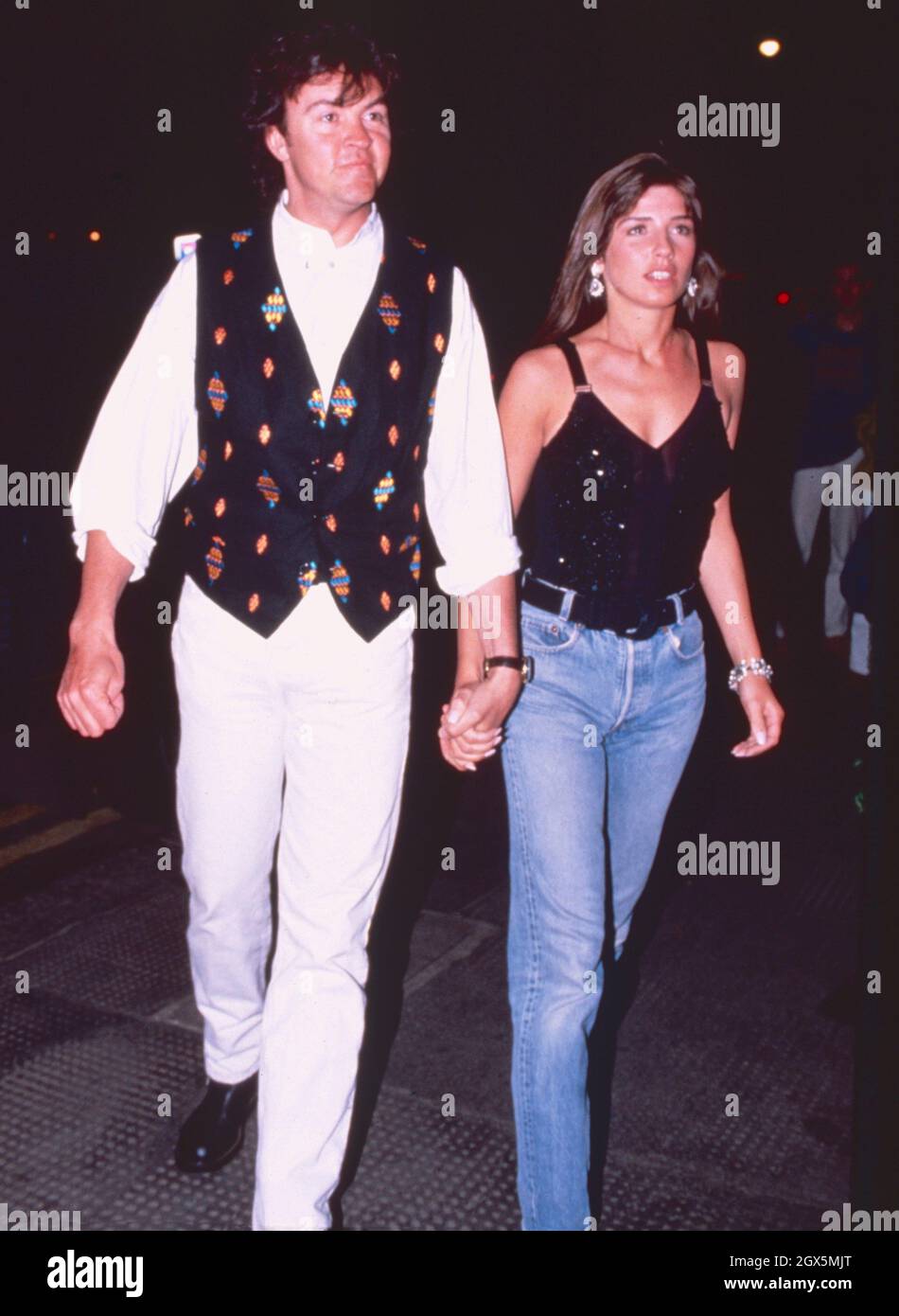 London, UK. LIBRARY. Singer Paul Young and Stacey Smith (also Stacey ...