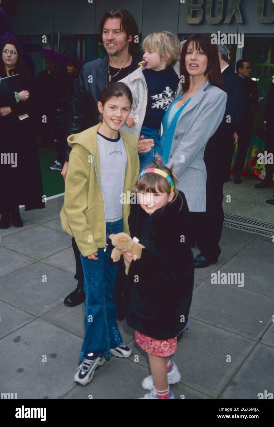 London, UK. LIBRARY. Singer Paul Young and Stacey Smith (also Stacey Young). With their children ...