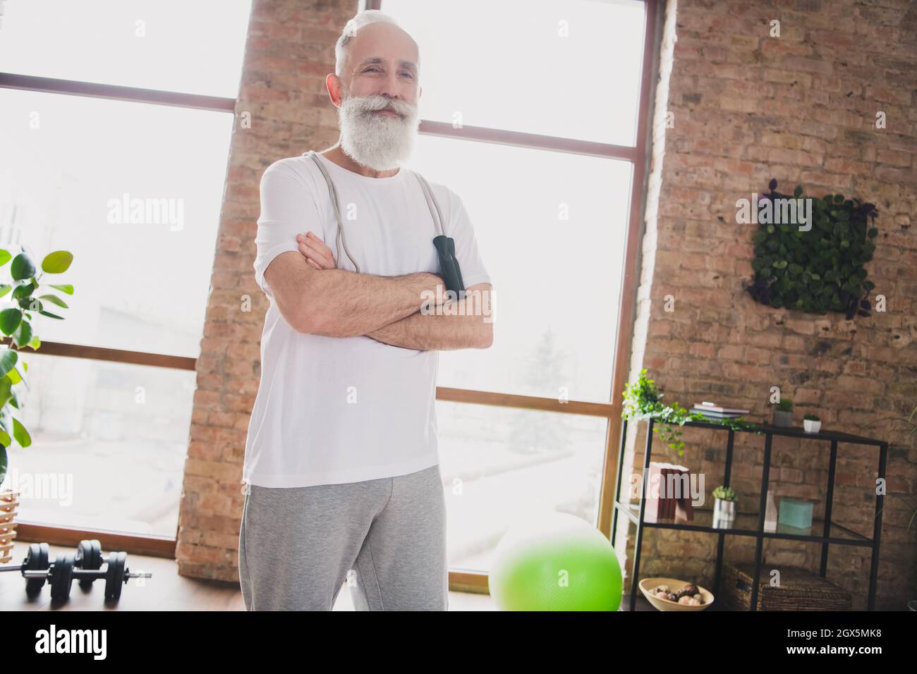 Photo of happy cool confident energetic active grandfather with crossed ...