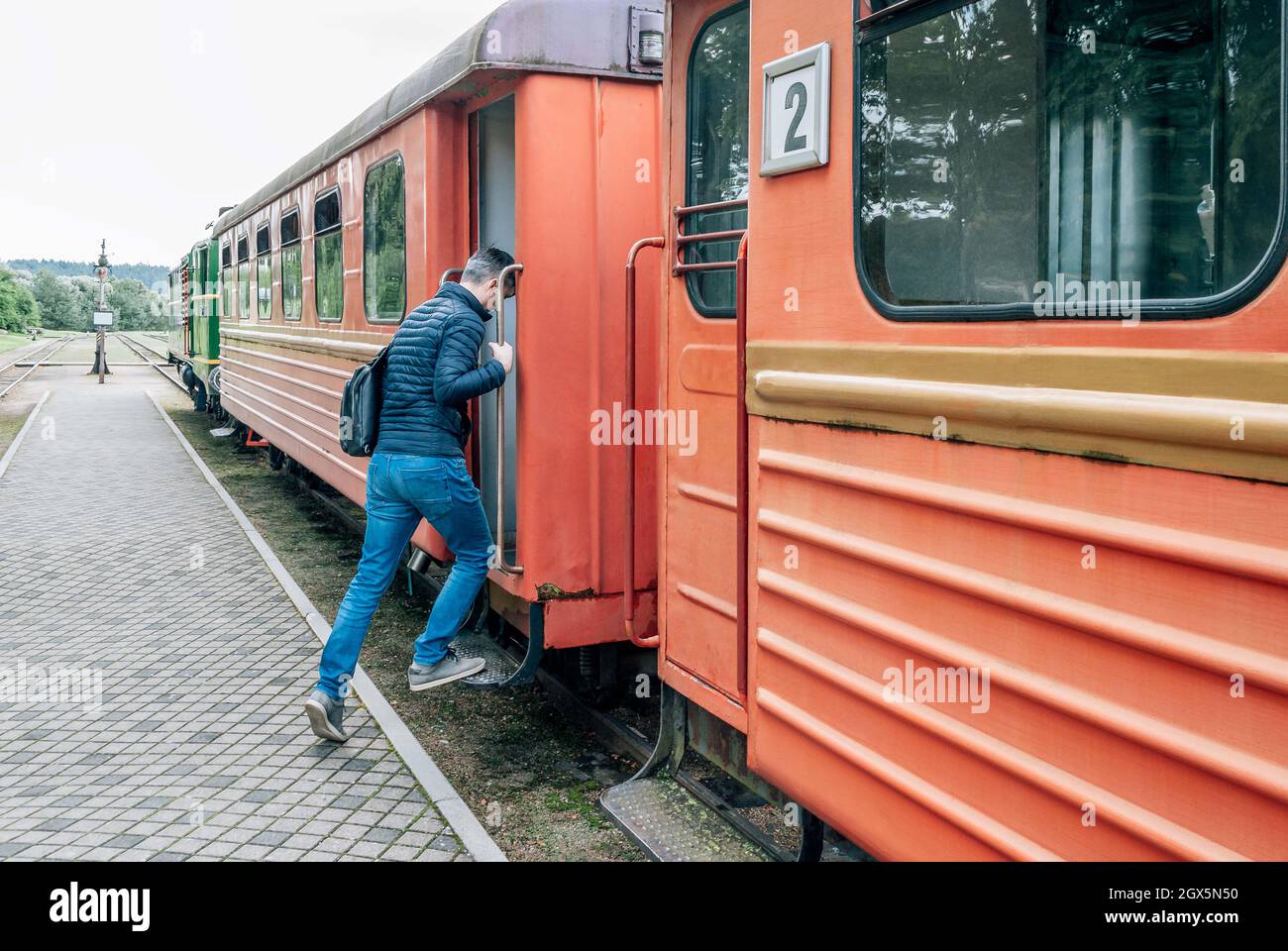 Man entering train hi-res stock photography and images - Alamy