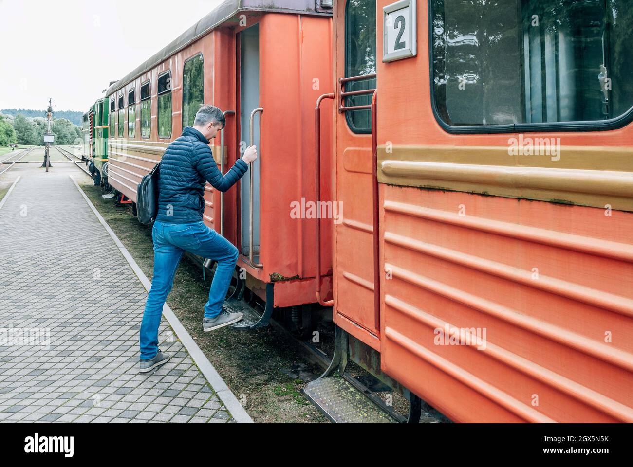 Man entering train hi-res stock photography and images - Alamy