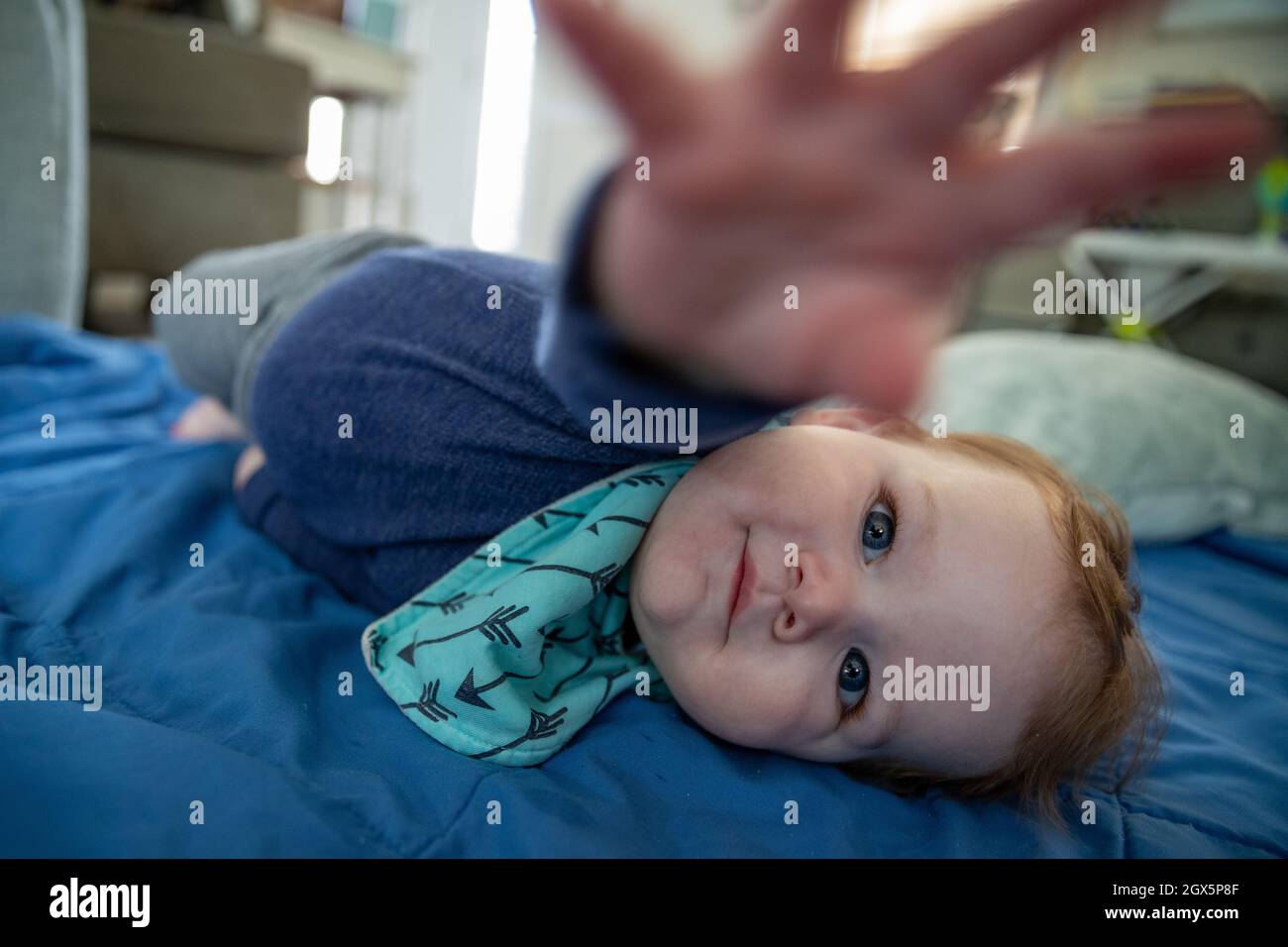 Toddler reaching camera hi-res stock photography and images - Alamy