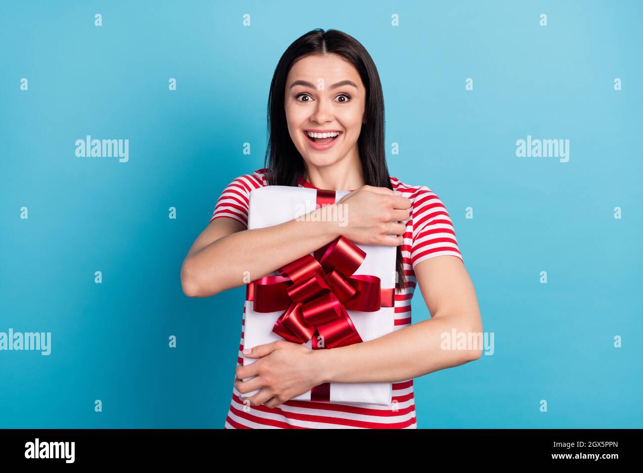 Photo of young girl happy positive smile hug cuddle present box ...