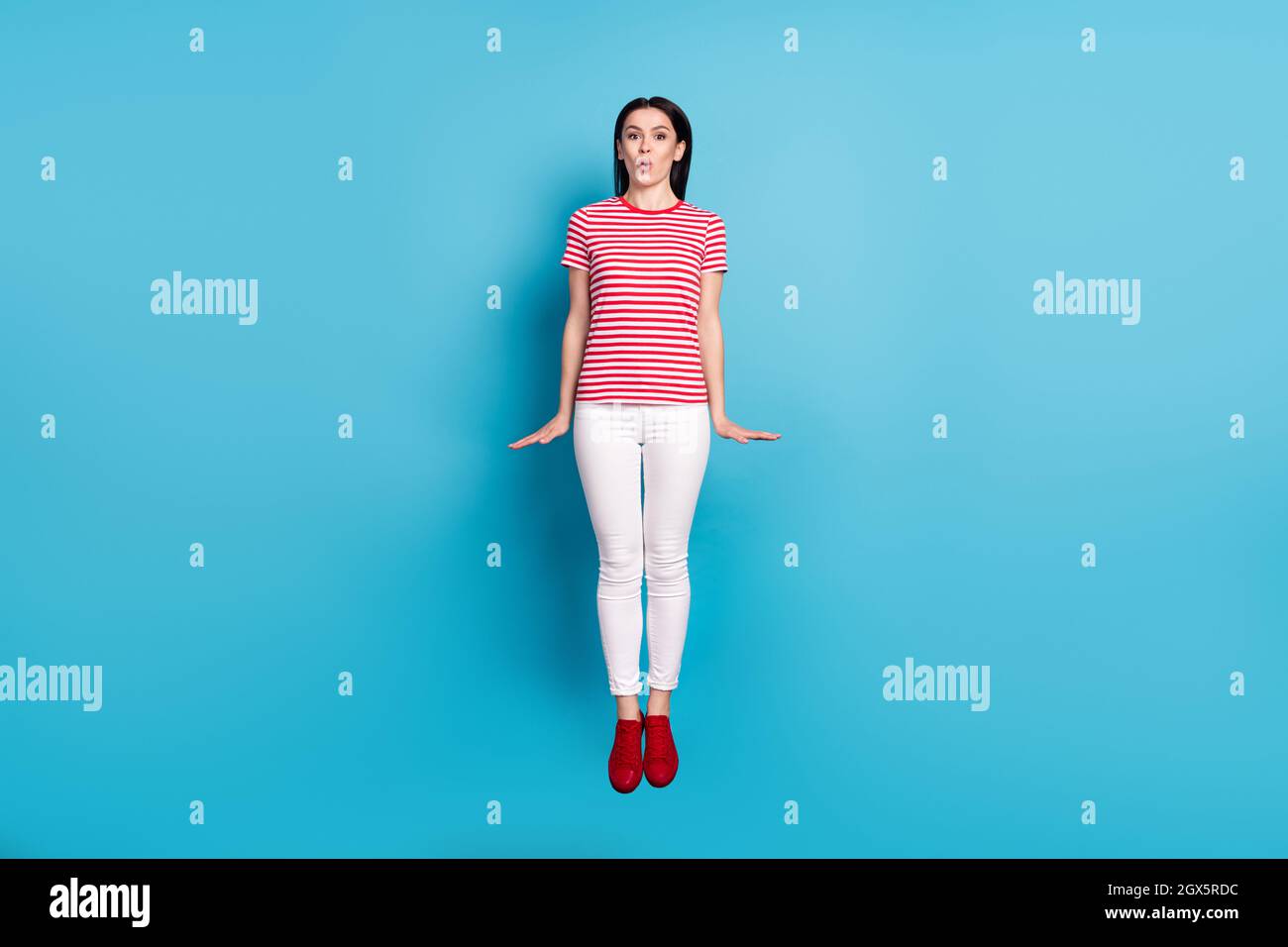 Full length photo of young girl amazed excited shocked surprised jump ...