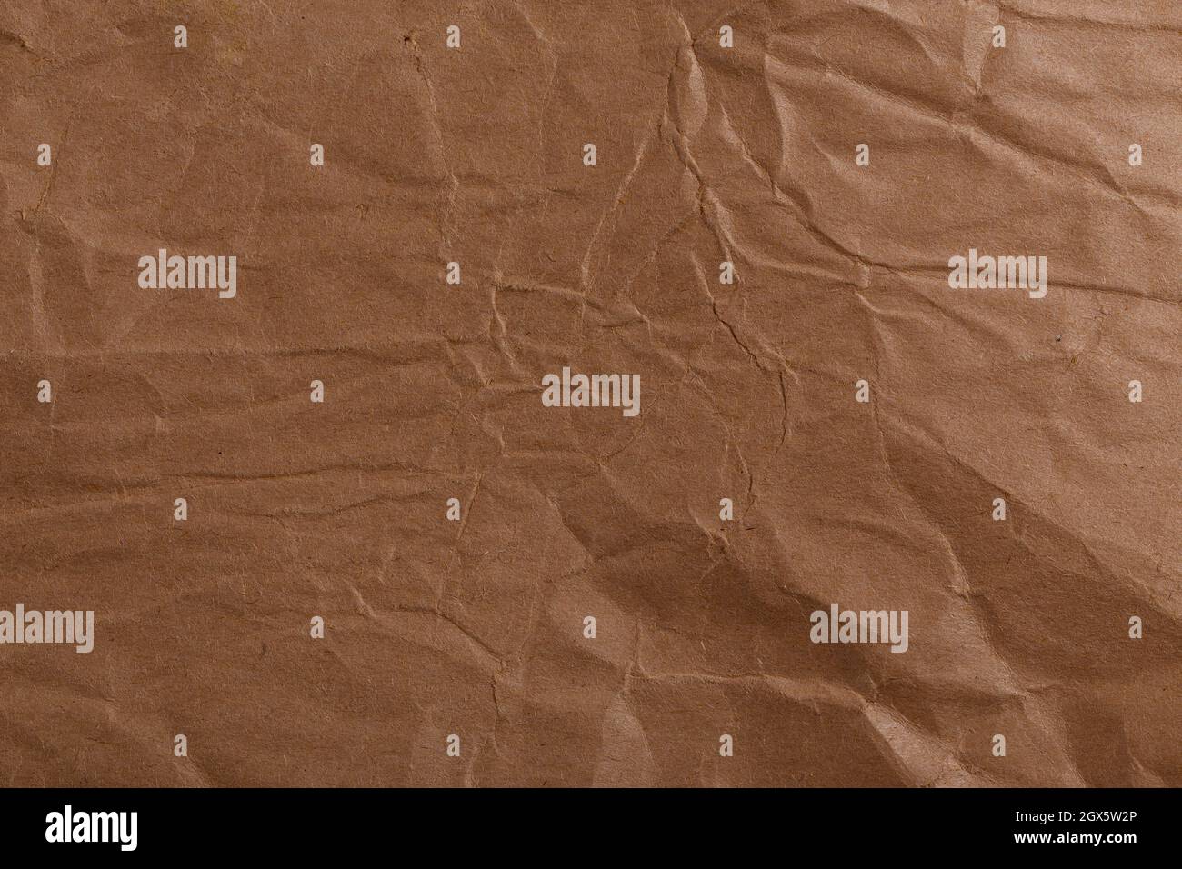 Ragged crumpled brown kraft paper texture and full frame background ...