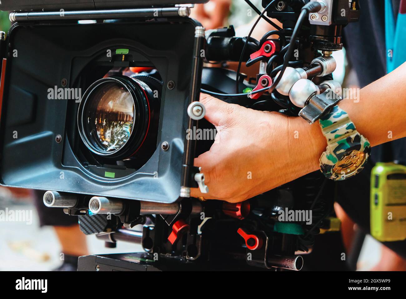 Filming with professional camera, Film Crew Stock Photo - Alamy