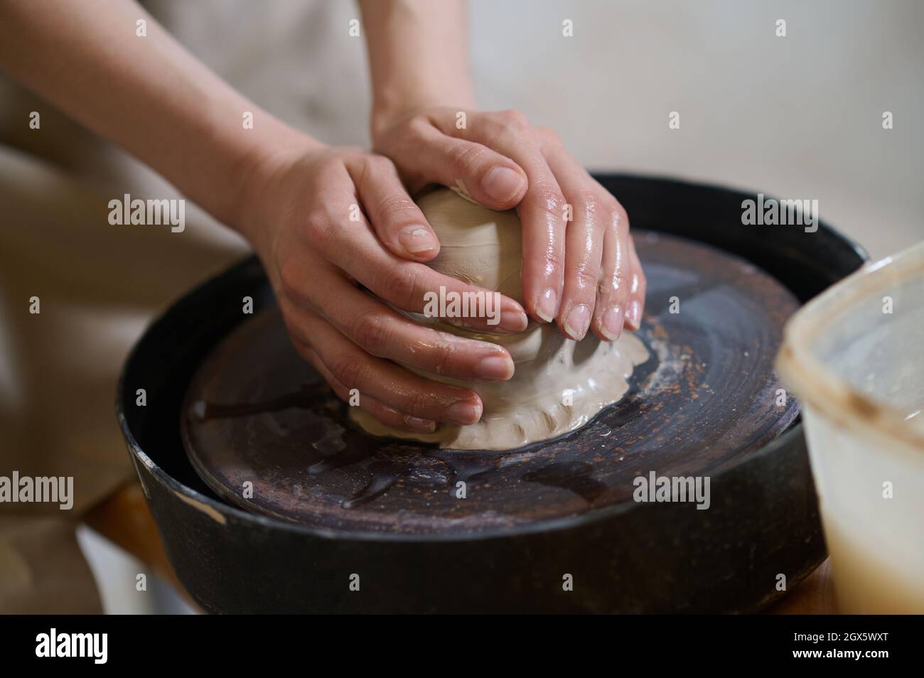 Hands molding clay hi-res stock photography and images - Alamy