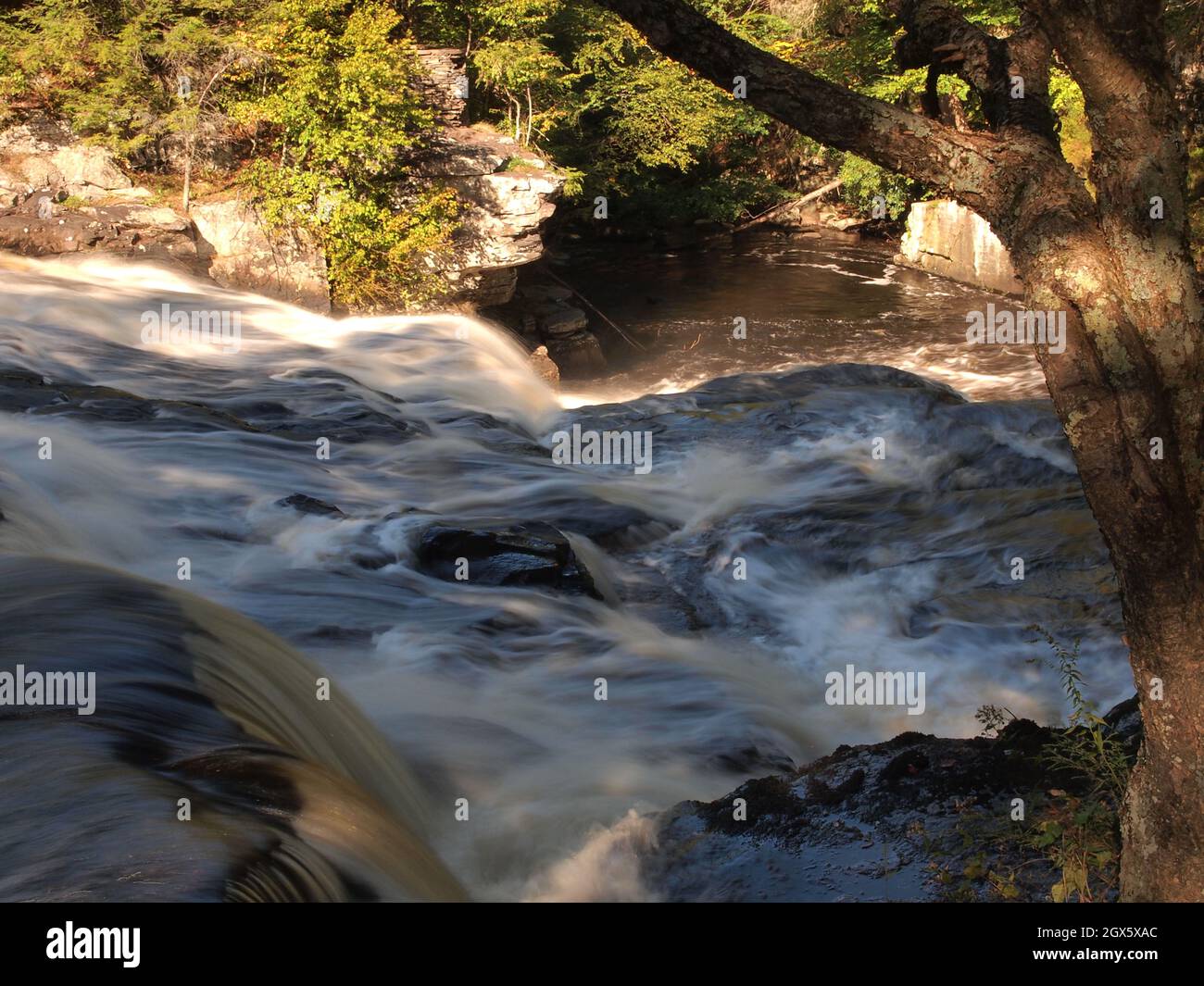 Water splashing from a small waterfall hi-res stock photography and ...
