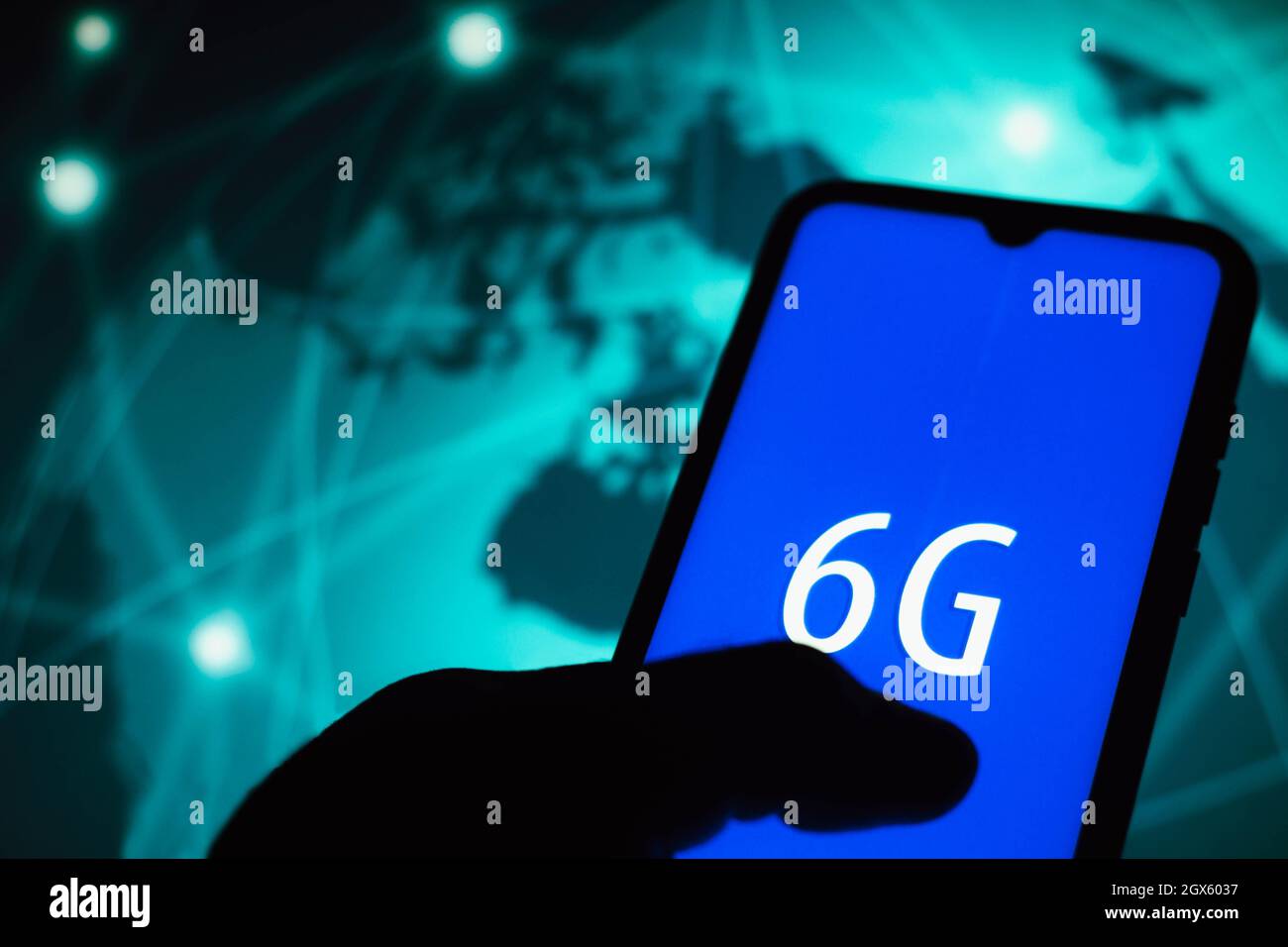 In this photo illustration, a 6G logo seen displayed on a smartphone ...