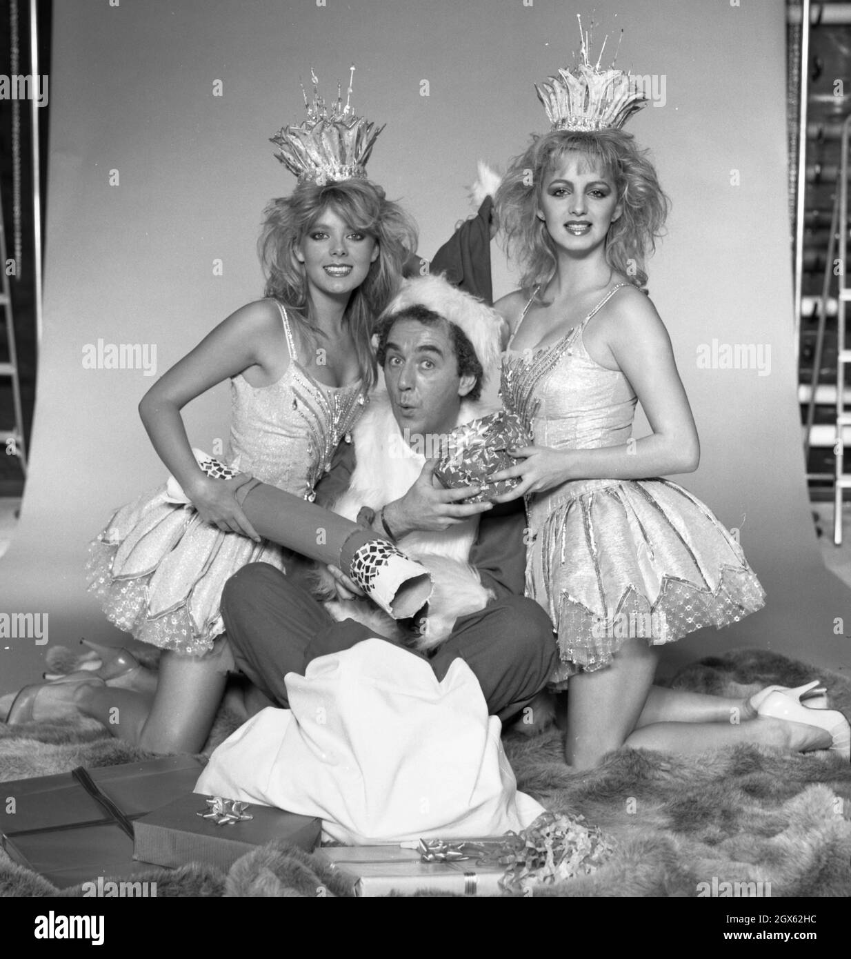 London, UK. LIBRARY. Lenny Bennett with models Lindsay Neil (L) and ...