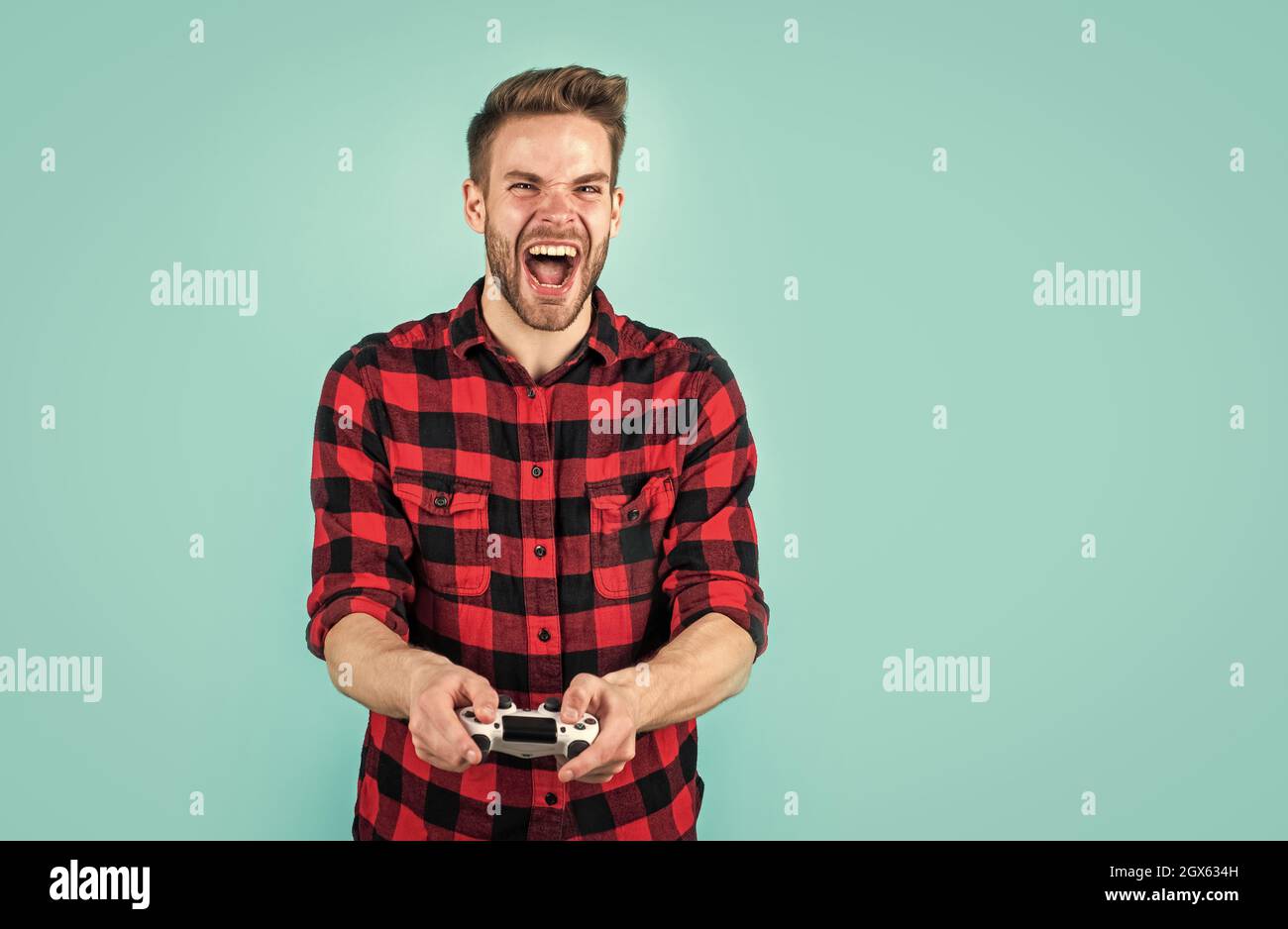 living in digital world. male hobby and free time. gamer in checkered ...