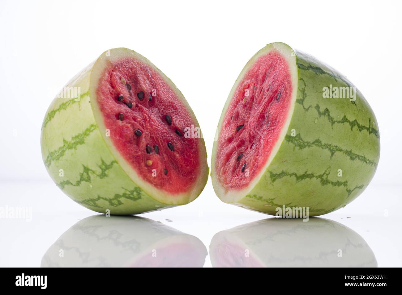 Watermelon Slices, one half of watermelon arranged on a white ...