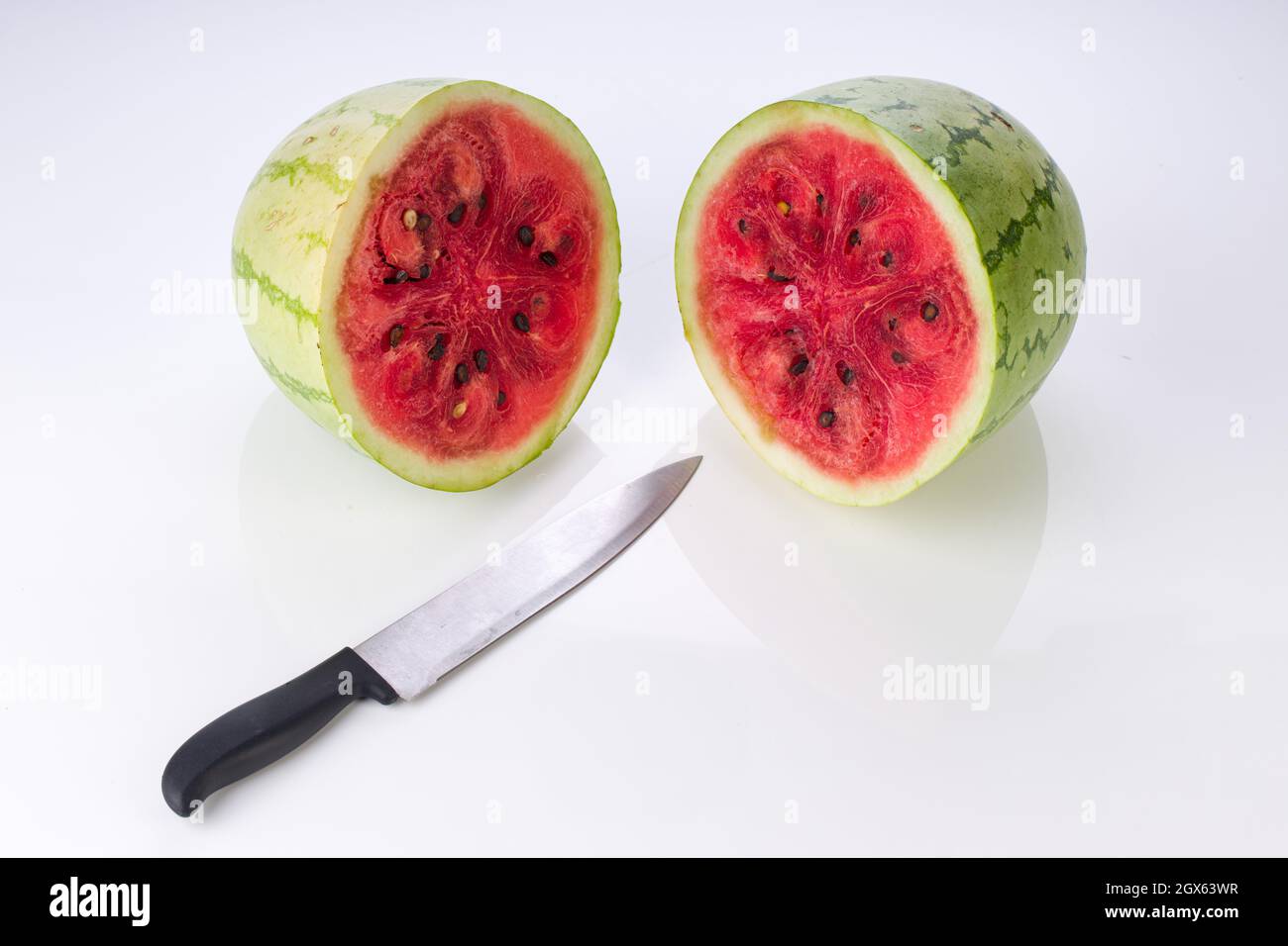 Watermelon Slices, one half of watermelon arranged on a white ...