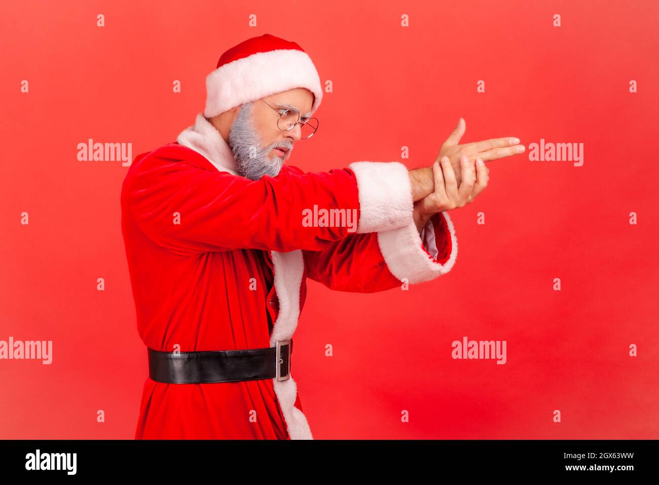 Santa with gun hi-res stock photography and images - Alamy