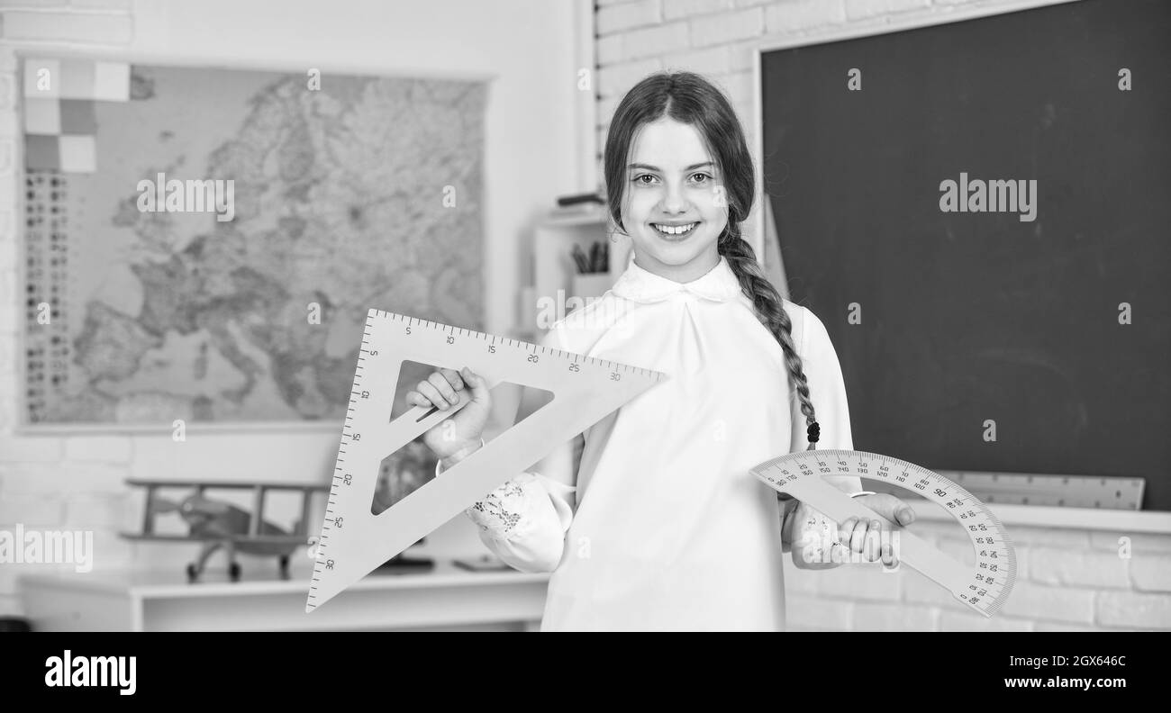 back to school. High school student learning geometry in class. measure ...