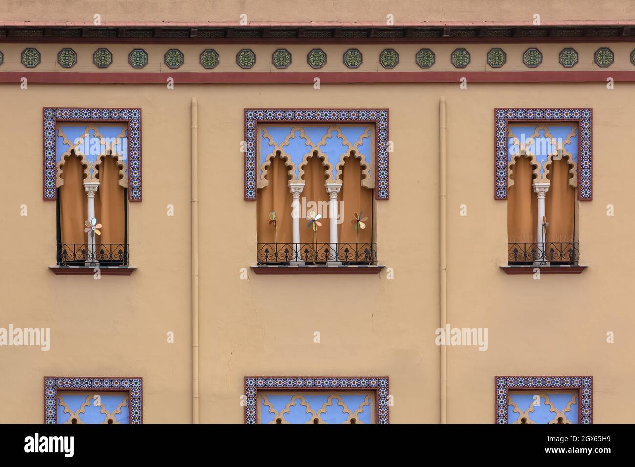 Detailed view of the exterior facade of a Moorish-style building ...