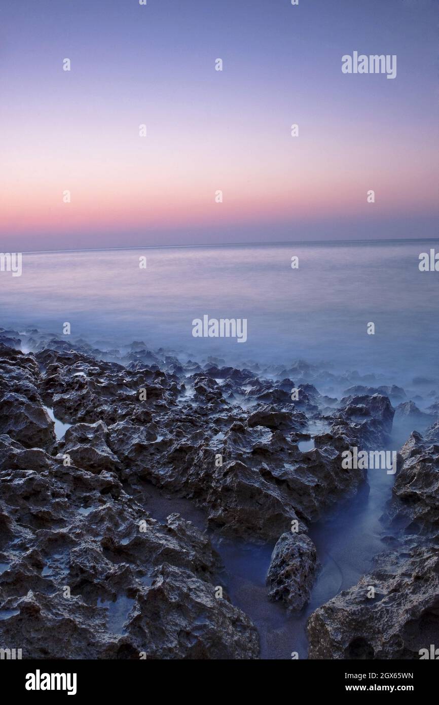 Vertical shot of the Praia da Foz beach during sunset Stock Photo - Alamy