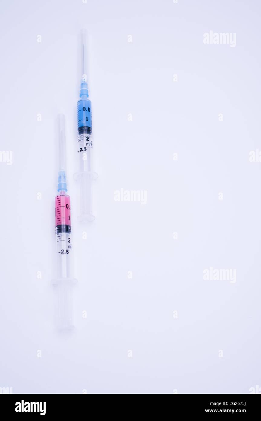 isolated sterilized injection syringe on a white background Stock Photo ...