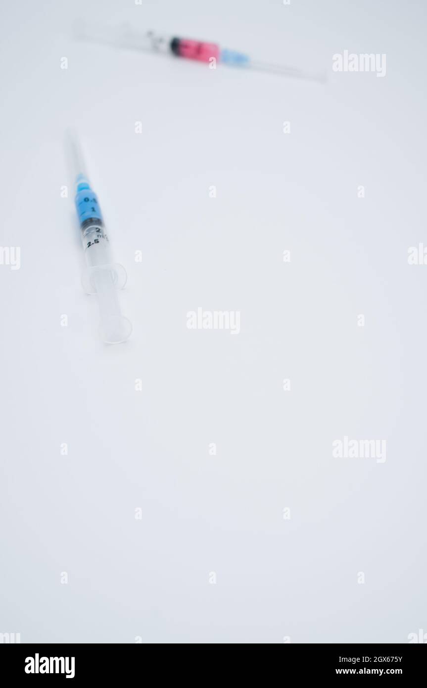 isolated sterilized injection syringe on a white background Stock Photo ...