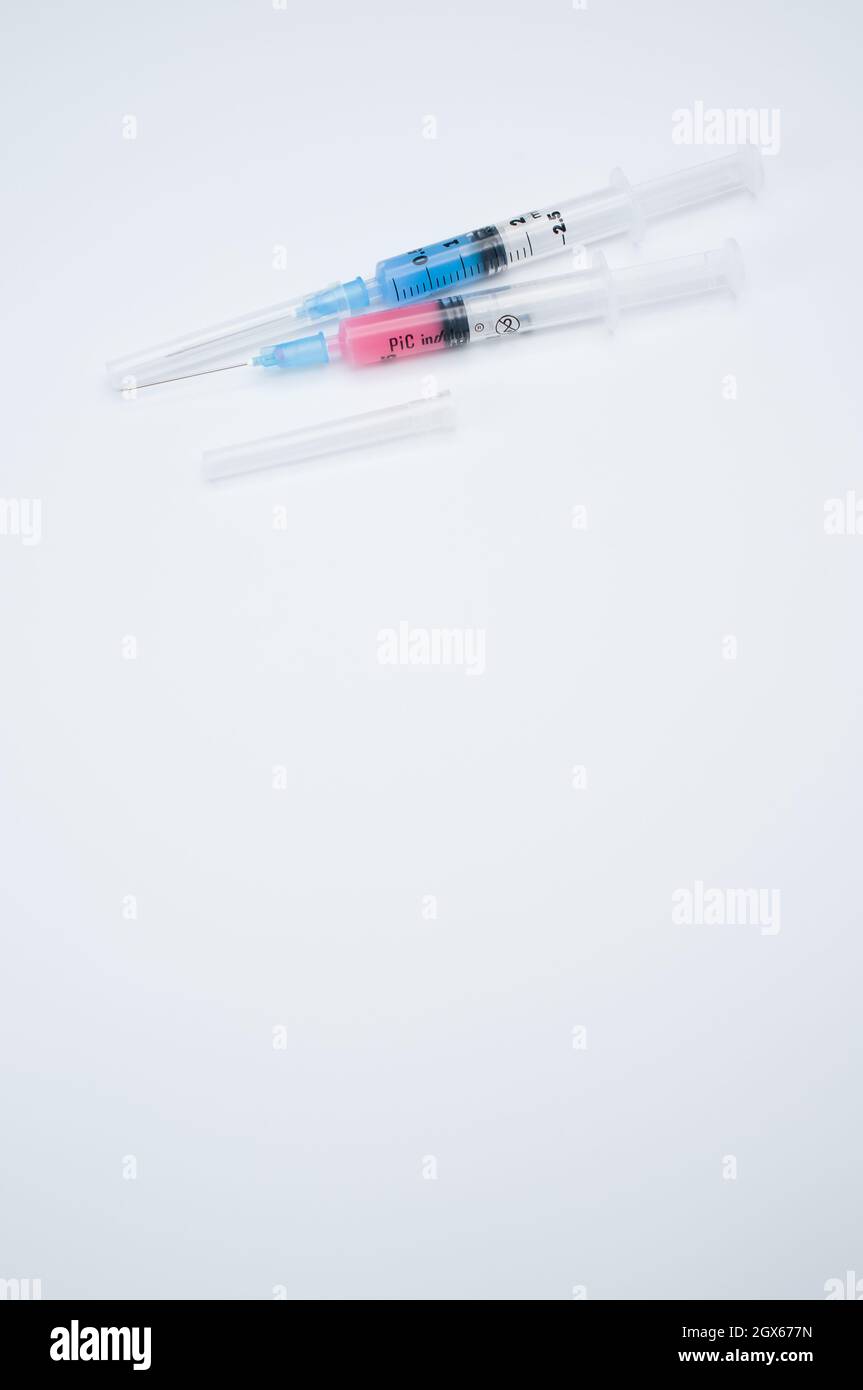 isolated sterilized injection syringe on a white background Stock Photo ...