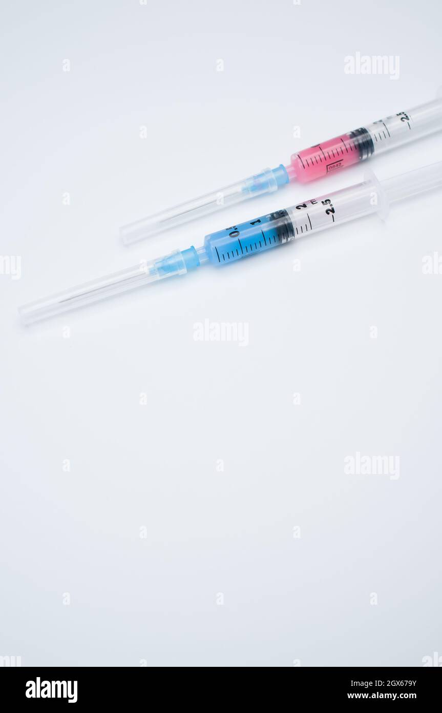 isolated sterilized injection syringe on a white background Stock Photo ...