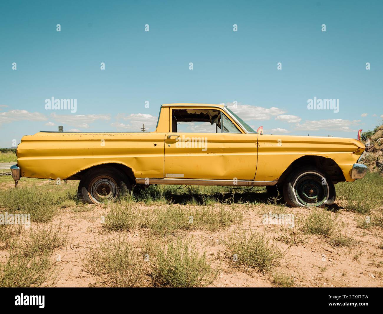 Vintage yellow car on Route 66, in Peach Springs, Arizona Stock Photo ...