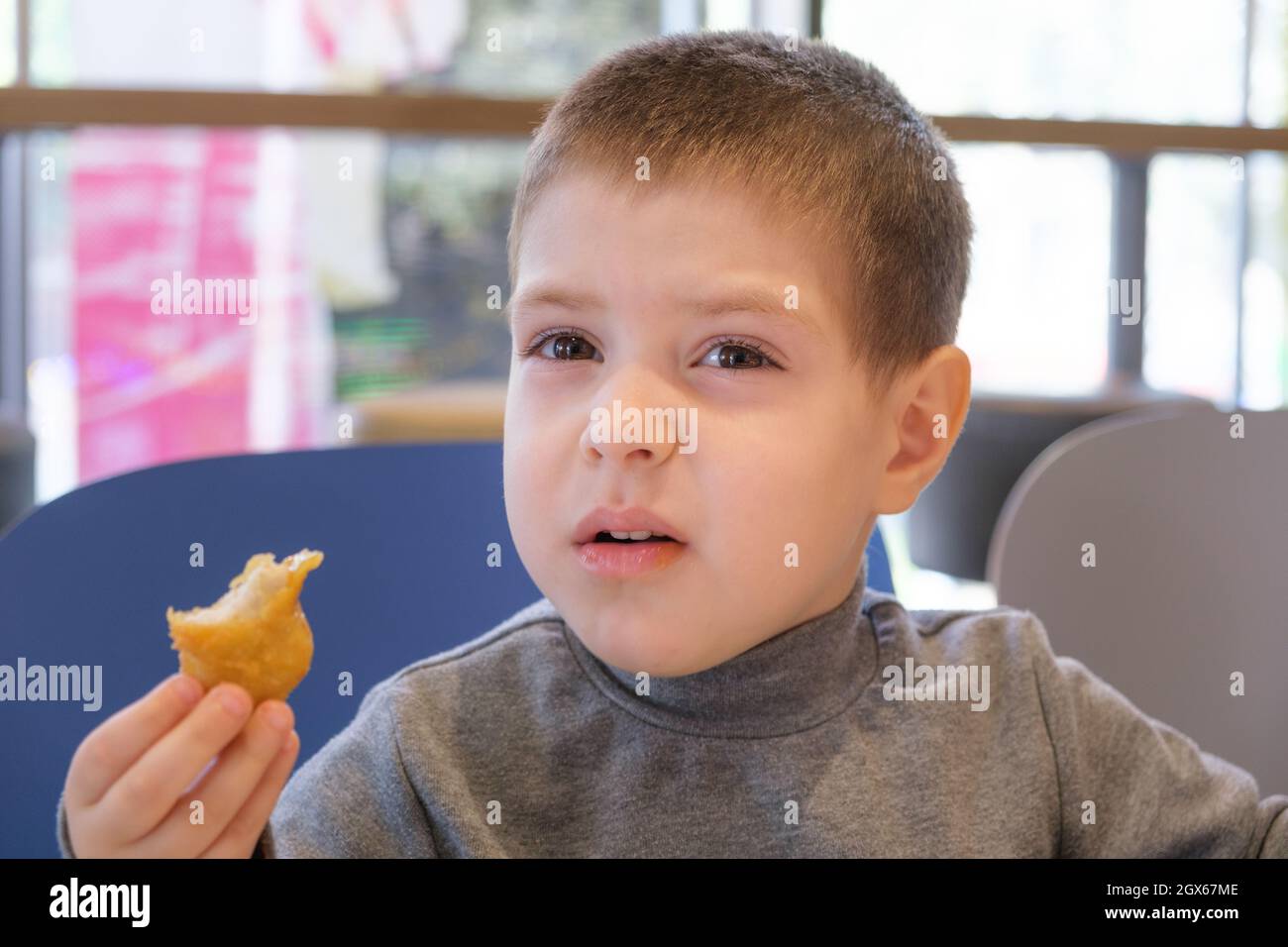 Boy chicken nugget hi-res stock photography and images - Alamy