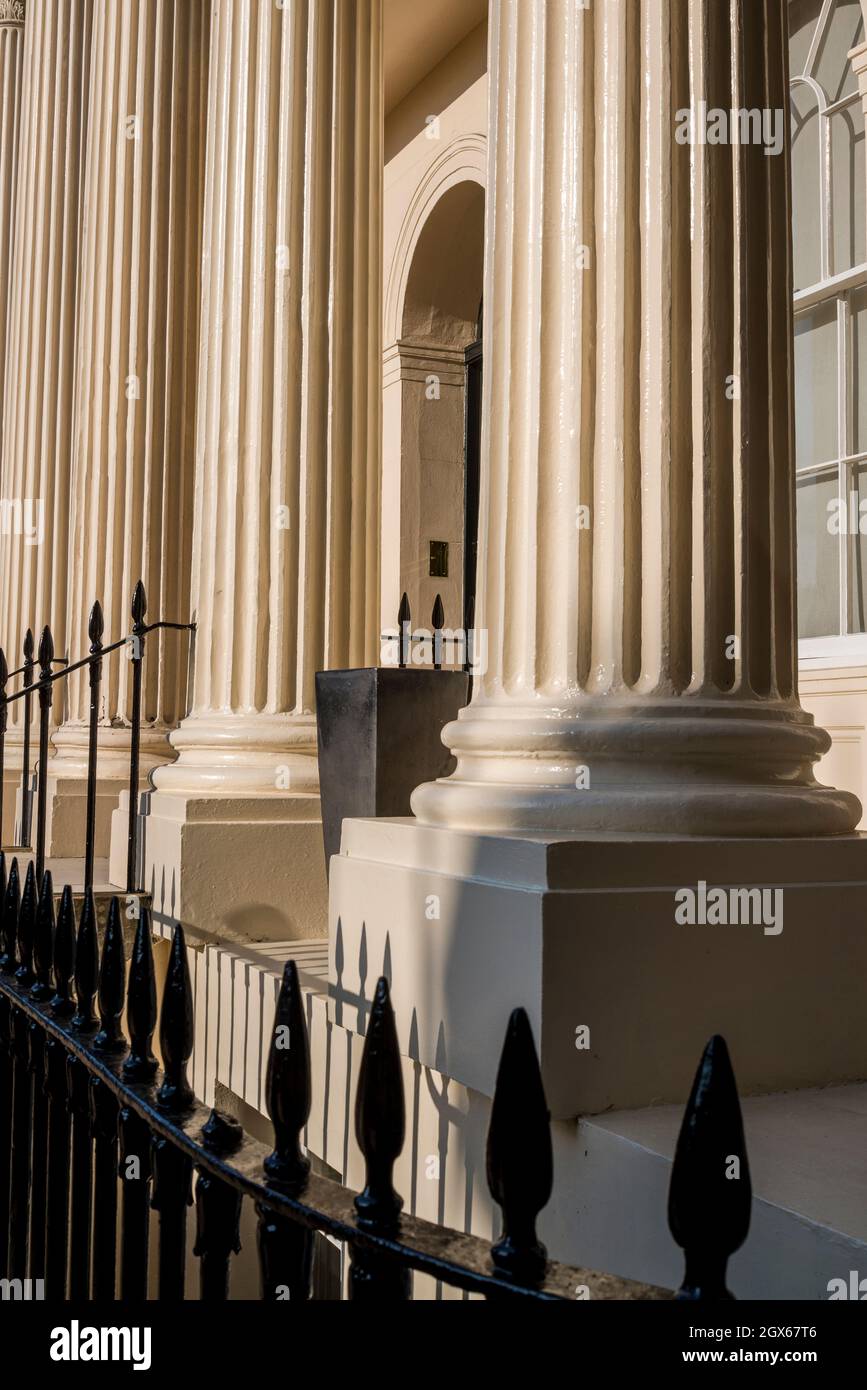 Detail of Neo-classical style portico with fluted Corinthian columns ...