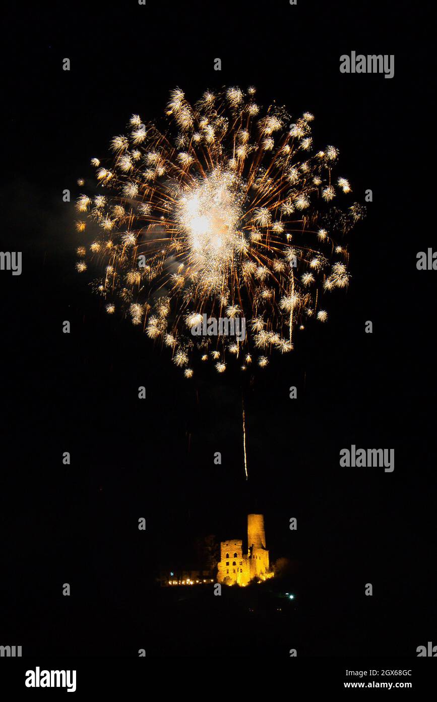 Illuminated castle and a firework on the black sky Stock Photo - Alamy