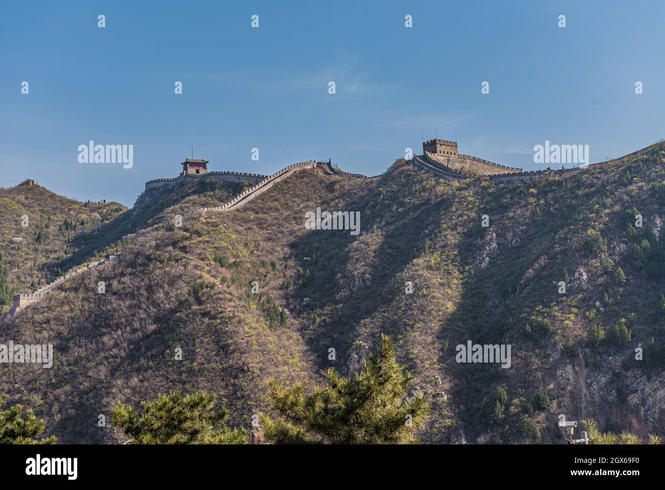 A Landscape photo looking up toward watch towers along a section of the ...