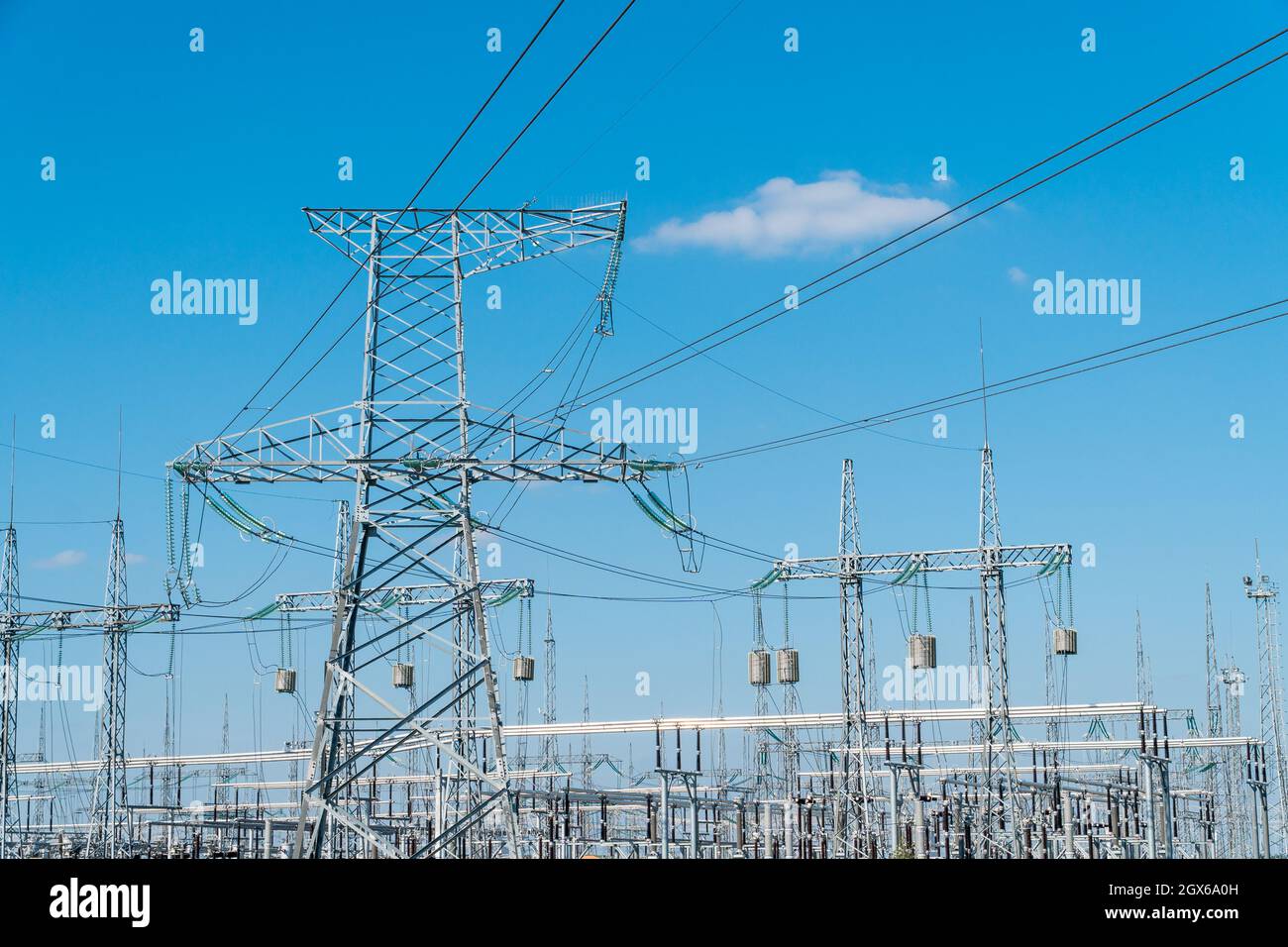 High voltage power lines. Modern electric energy industry Stock Photo ...