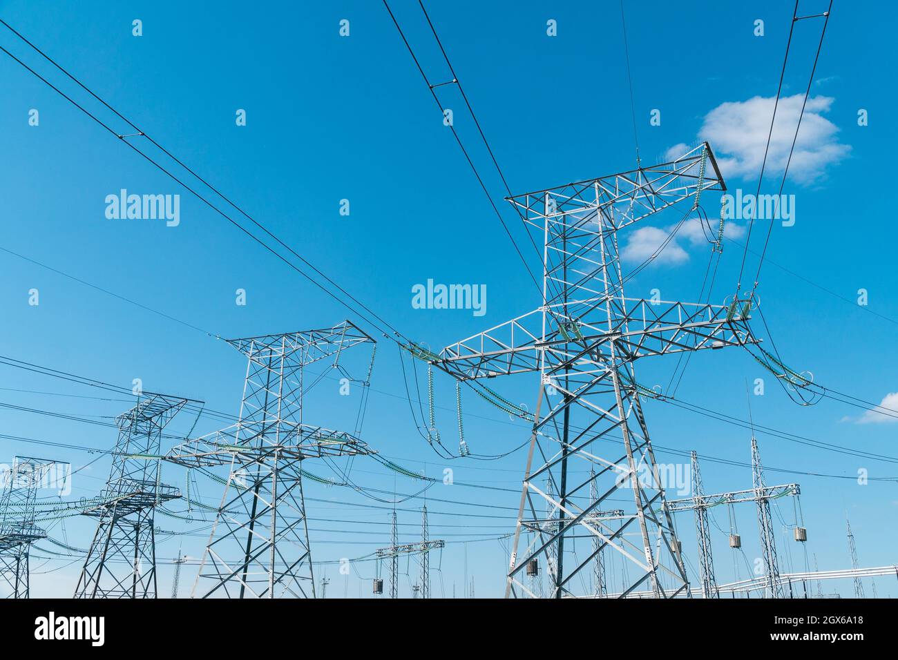 High voltage power lines. Modern electric energy industry Stock Photo ...