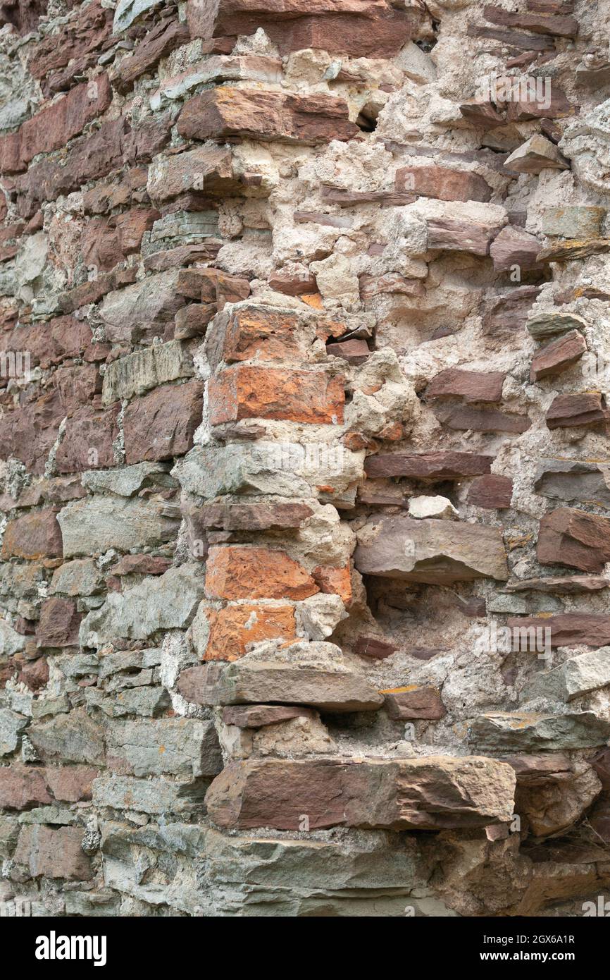 corner of a redstone wall. fragment of an ancient castle Stock Photo ...