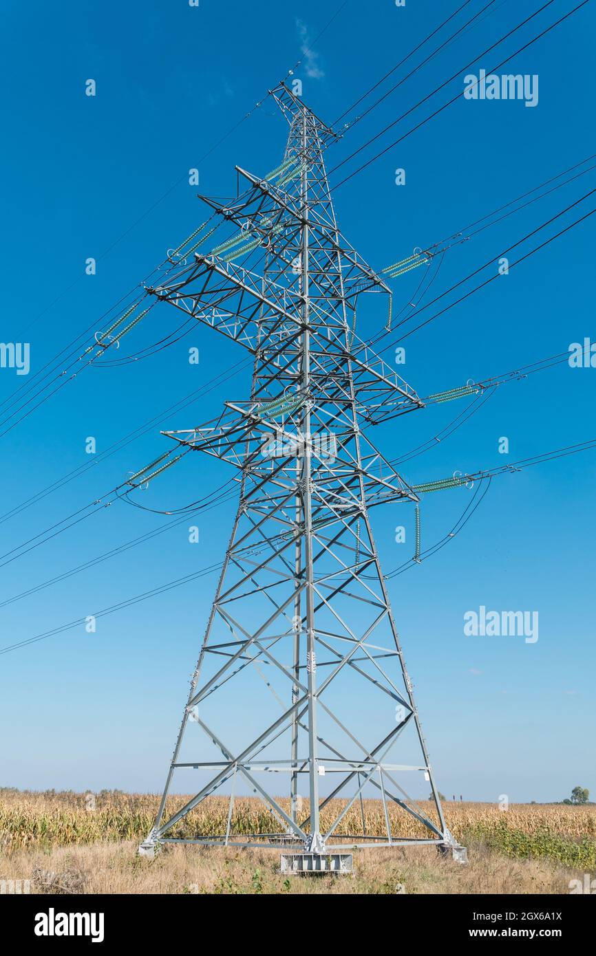 High voltage power lines. Modern electric energy industry Stock Photo ...