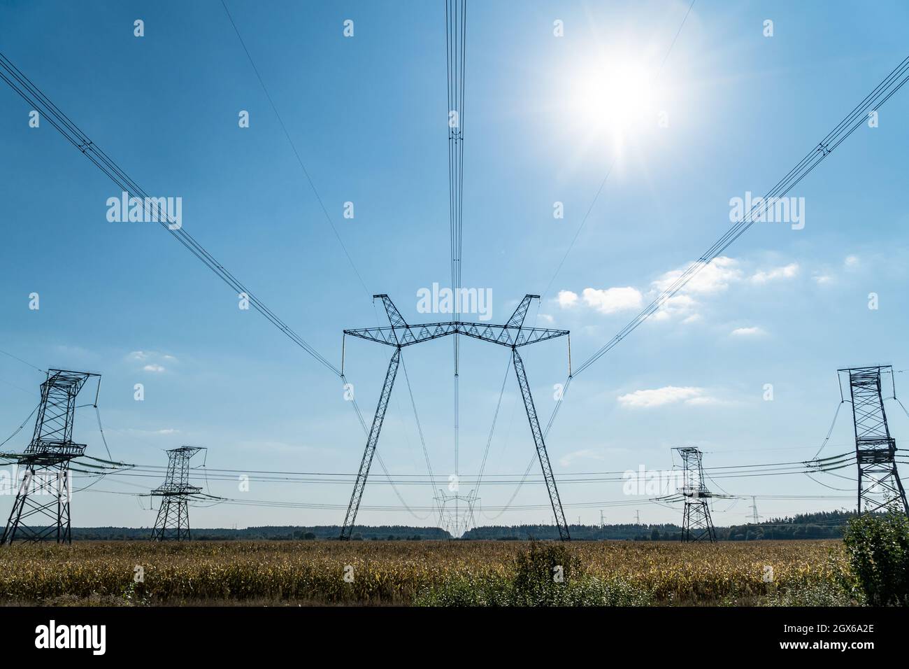 High voltage power lines. Modern electric energy industry Stock Photo ...