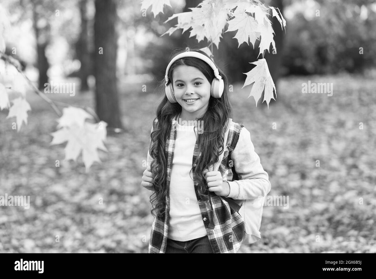 Cheerful kid in headphones Black and White Stock Photos & Images - Alamy