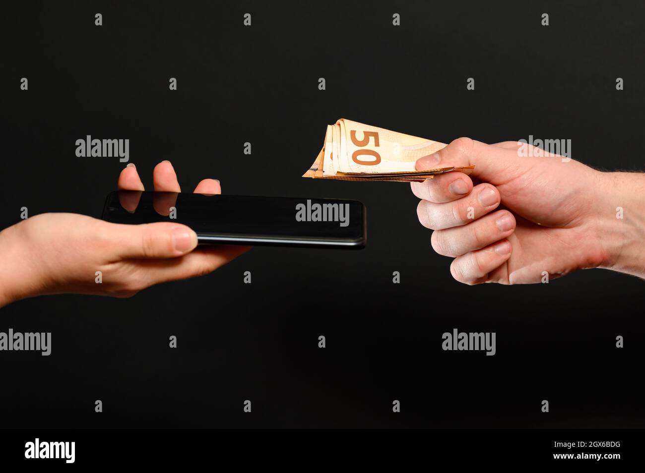 An example of retail trade in smartphones, payment for goods in cash ...