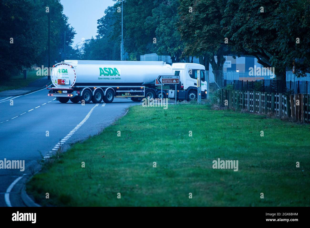 An ASDA fuel tanker returning to the Kingsbury fuel depot as dawn ...