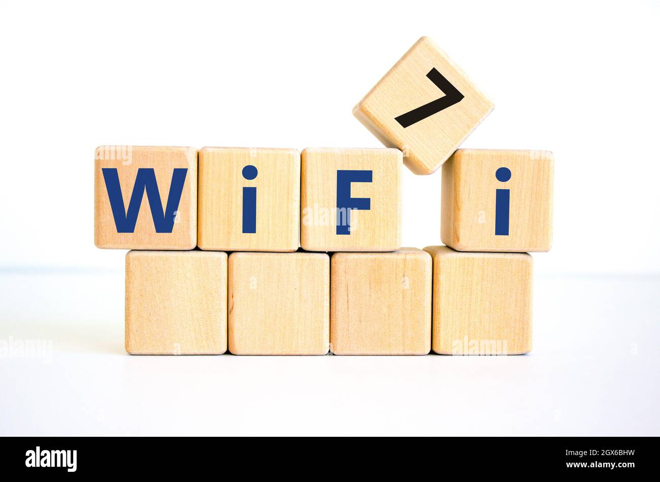 WiFi 7 symbol. The concept word WiFi 7 on wooden cubes. Beautiful white ...