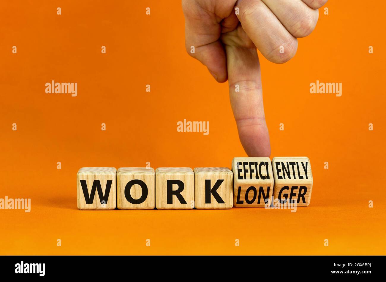 Work longer or efficiently symbol. Businessman turns cubes and changes ...