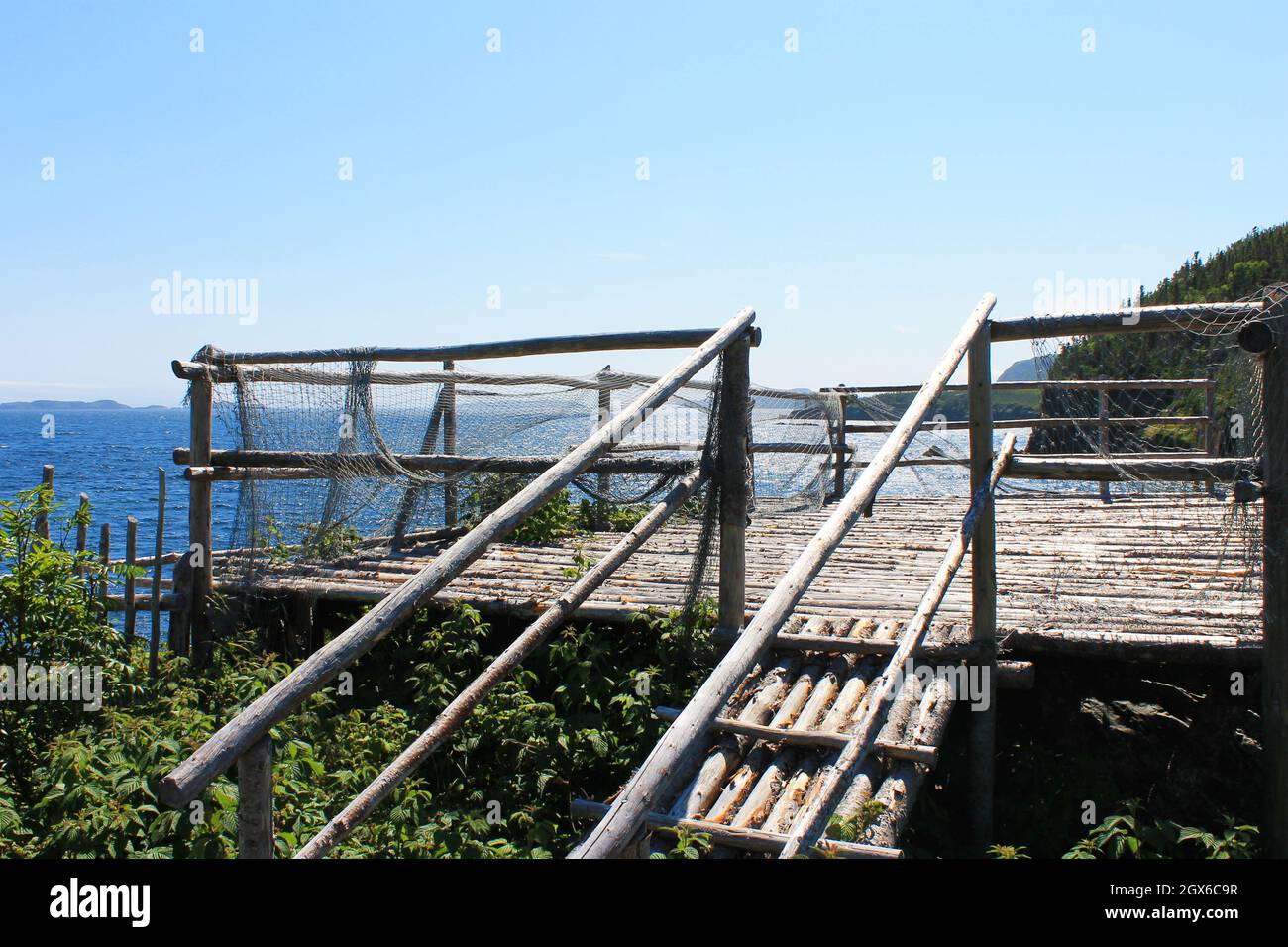 A fishing stage on a hill top, over looking the Atlantic Ocean Stock ...