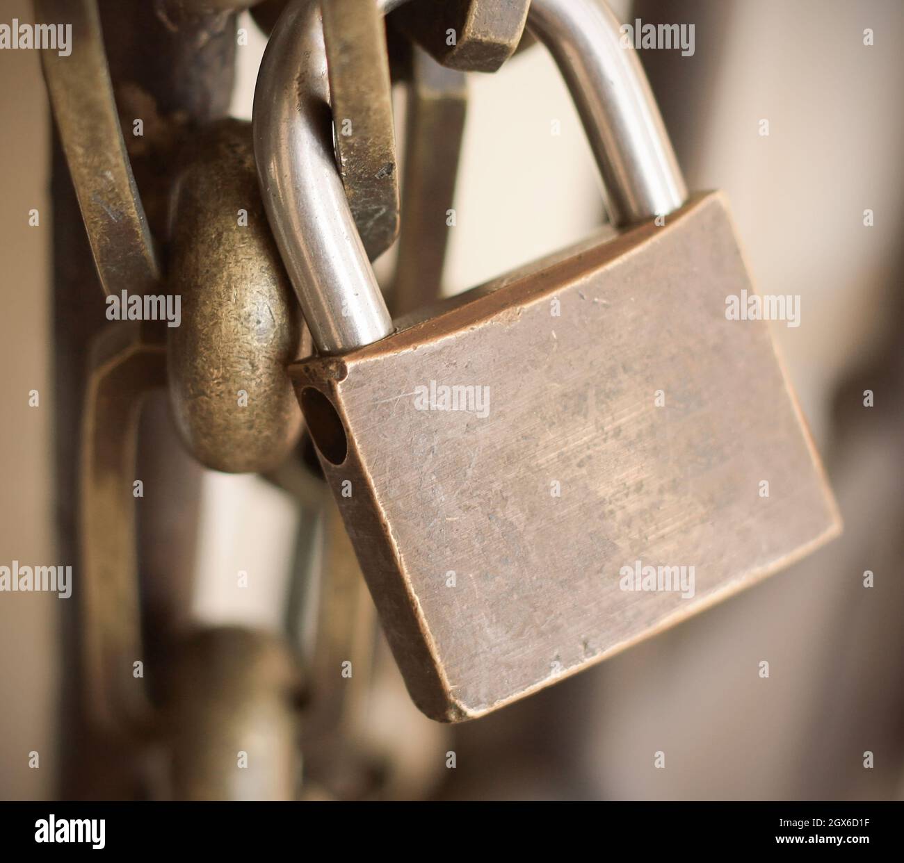 Padlock with chain on the old metallic construction Stock Photo - Alamy
