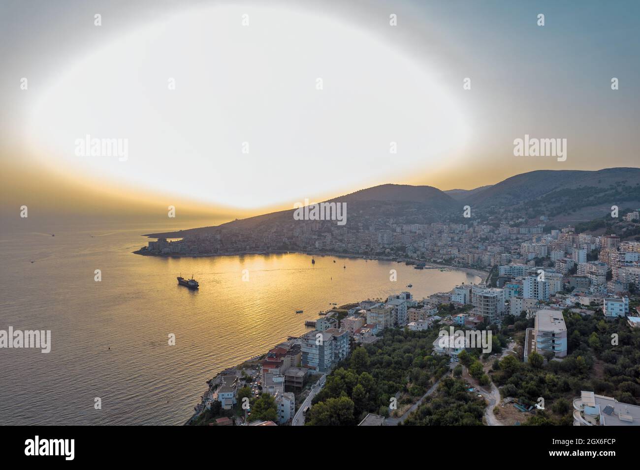 Aerial sunset drone view of Saranda city and port in Albania Stock ...