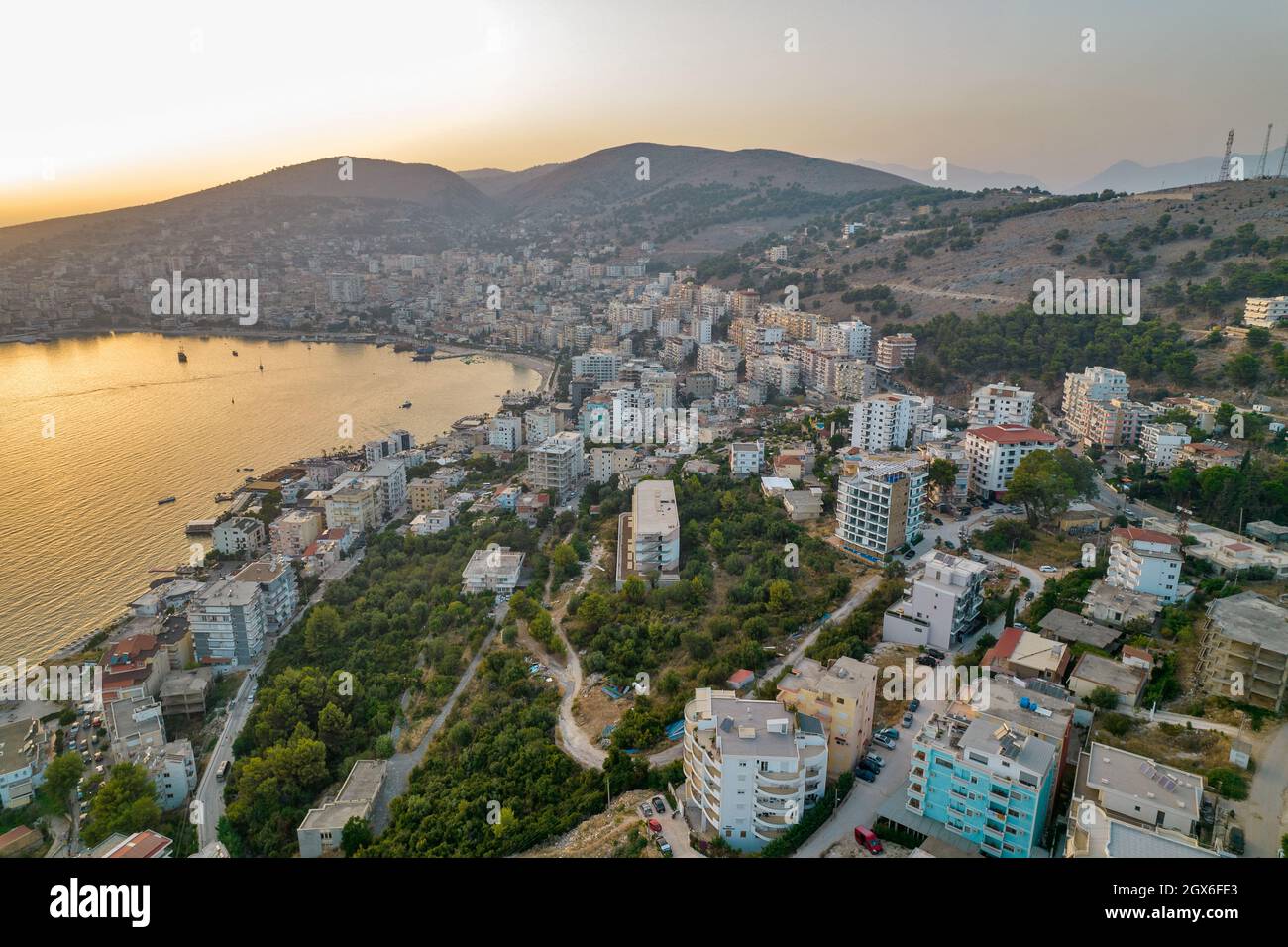 Aerial sunset drone view of Saranda city and port in Albania Stock ...
